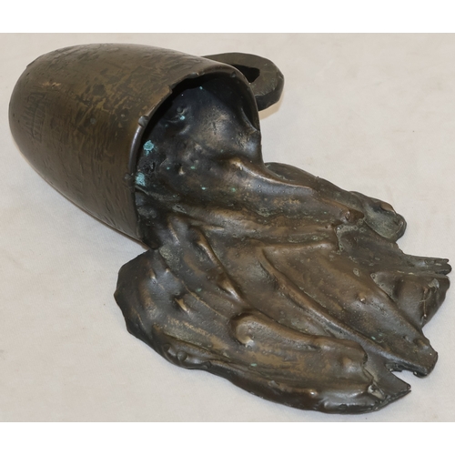 A Studio heavy sculpture of tipped over mug, unsigned, 24cm long, 9cm high