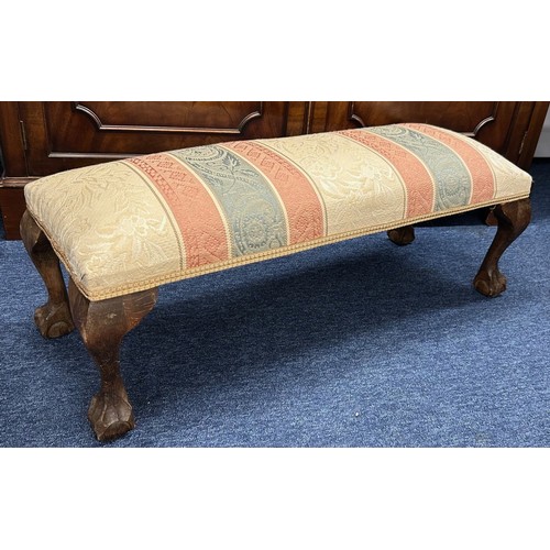 A small rectangular upholstered footstool, 78.5cm wide, 28.5cm deep ...
