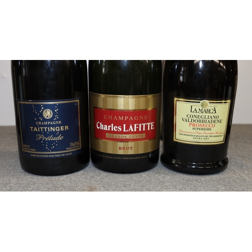 2 bottles of Taittinger Prelude Champagne, a bottle of Charles Lafitte ...