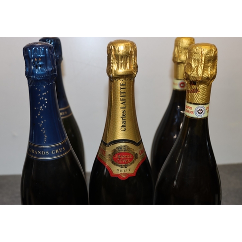 2 bottles of Taittinger Prelude Champagne, a bottle of Charles Lafitte ...