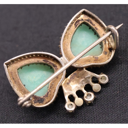 A 19th Century double heart shaped brooch mounted with a crown, inset ...