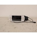 A Sony PSP 1003 console in white with charger - powers on, plays games