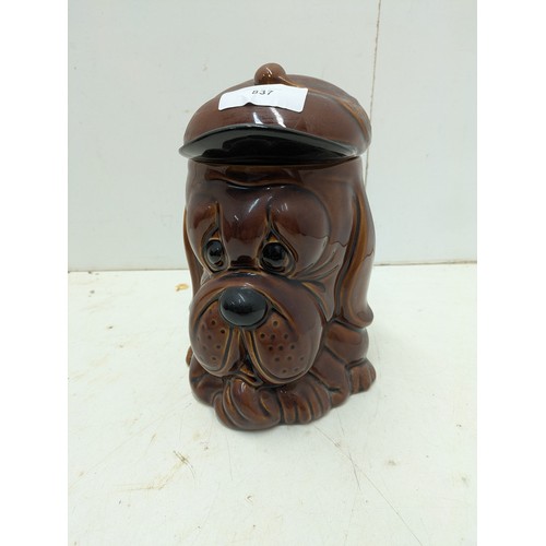 A collectible pek dog biscuit barrel
