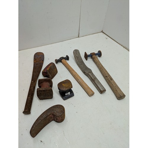 A selection of bodywork hammers and Dollies