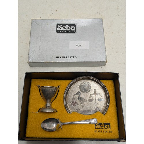 A Seba silver plated egg cup, spoon and plate set in presentation box