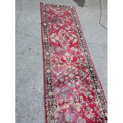 A large corridor runner area rug