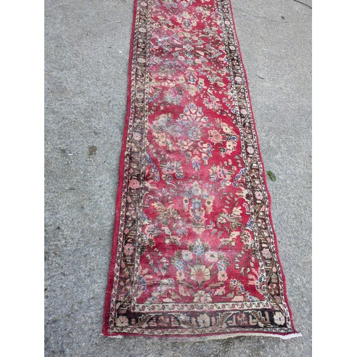 A large corridor runner area rug