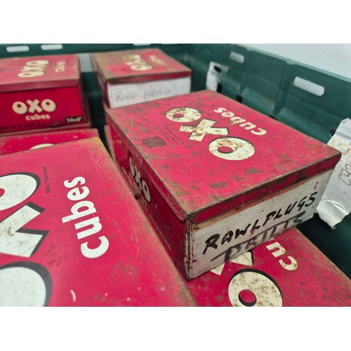 A large quantity of vintage metal oxo cube containers