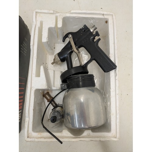 A Binks 222 spray gun in box