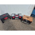 A selection of tools boxes including a black and Decker workmate ...