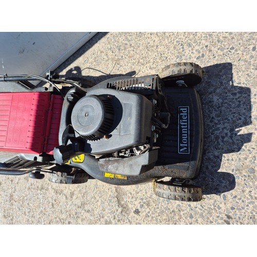 A Mountfield petrol lawn mower
