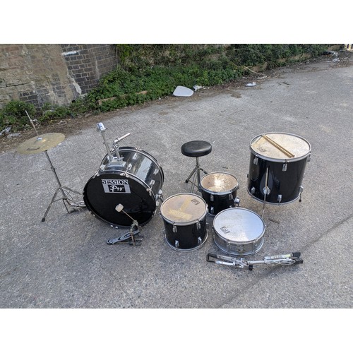 A Session pro drum kit with stool and drumsticks