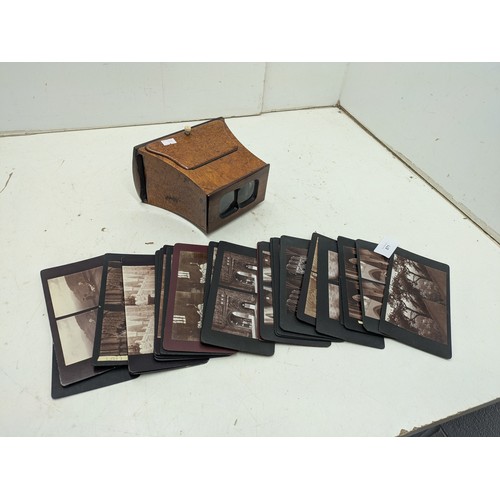 A set of antique stereoscopic cards with a viewer