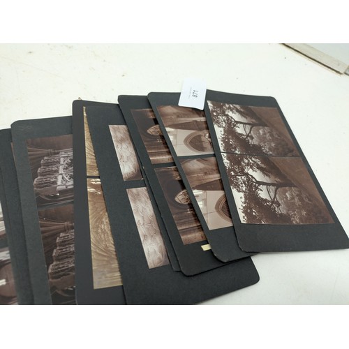 A set of antique stereoscopic cards with a viewer