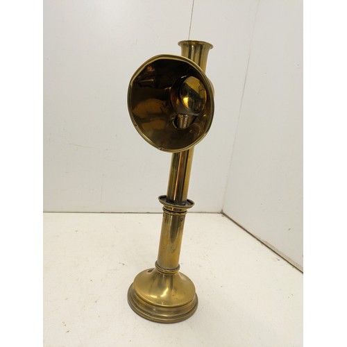 A vintage brass candle lamp