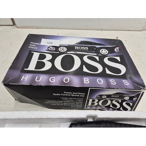 A Hugo Boss RC car in box