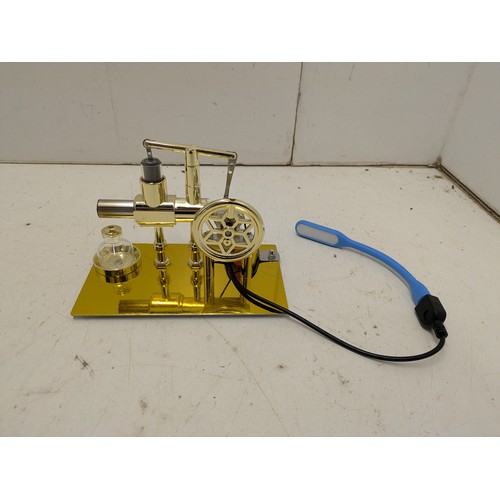 A miniature spirit engine with usb light