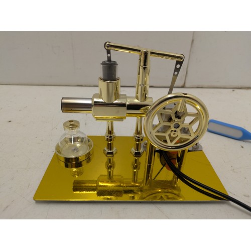 A miniature spirit engine with usb light