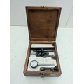 A mercer measuring apparatus in mahogany case