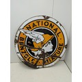 A vintage national benzole mixture enamel sign