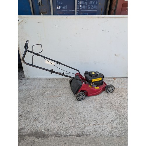 A Mountfield ep414 petrol lawn mower with a rs100 engine - running
