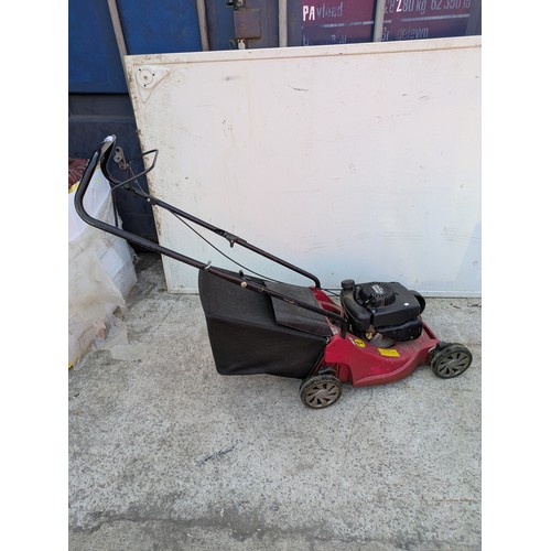 A Mountfield hp411 petrol lawn mower with a rs100 engine