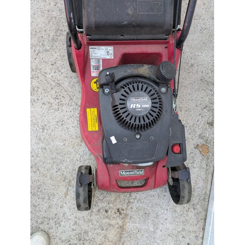A Mountfield hp411 petrol lawn mower with a rs100 engine