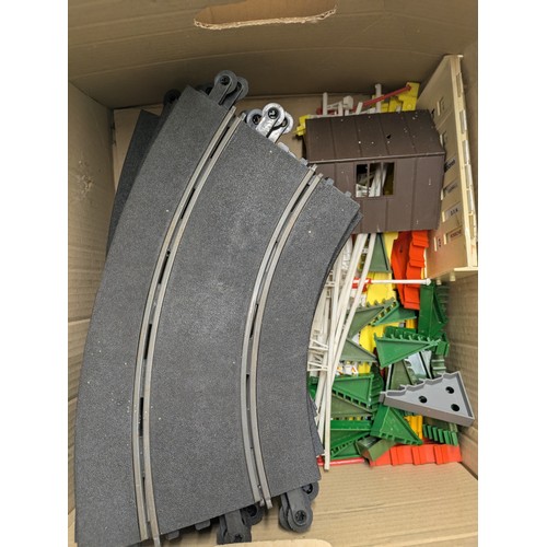 A selection of vintage Scalextric buildings and track