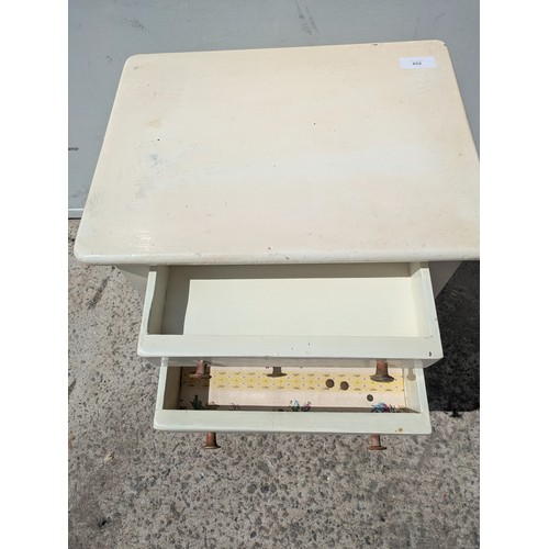 A vintage 2 drawer side table