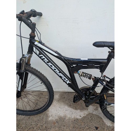 A Muddyfox recoil 26 full suspension mountain bike