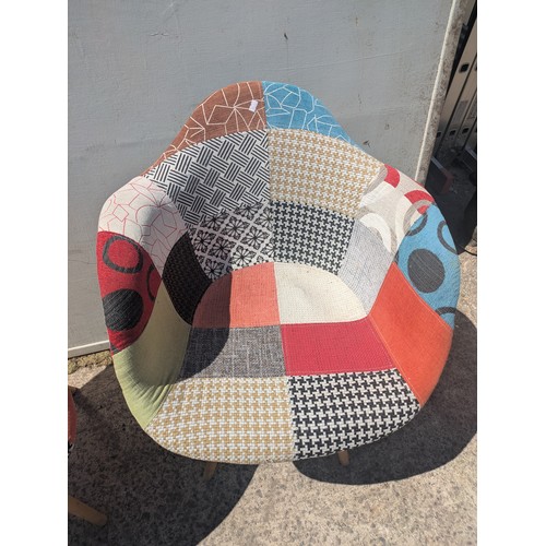 A pair of unique retro bucket chairs