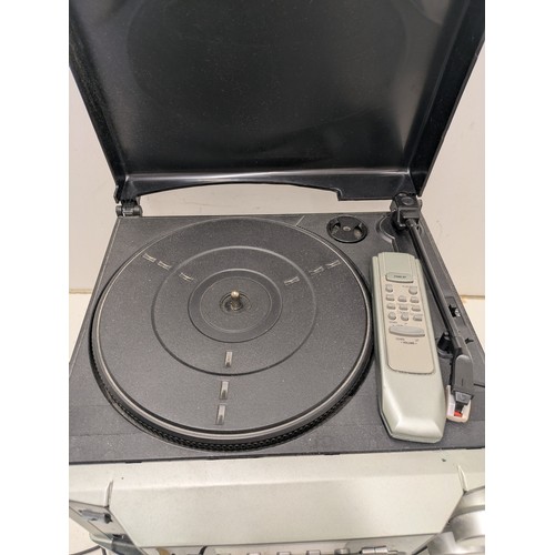 A hifi system with turntable dual cassette deck and 3 disc cd player