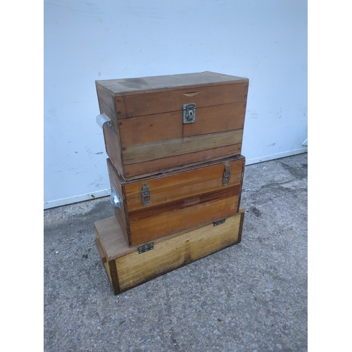 A trio of vintage Oak storage boxes