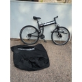 A Hummer Montague Military technology folding push bike in carry case