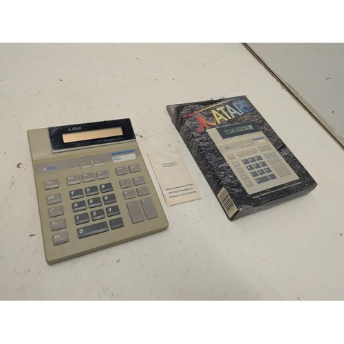 A retro Atari CC1900 calculator in original box
