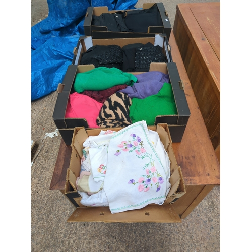 A large quantity of various modern and vintage clothing