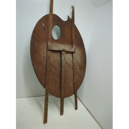 A freestanding painted artists pallet