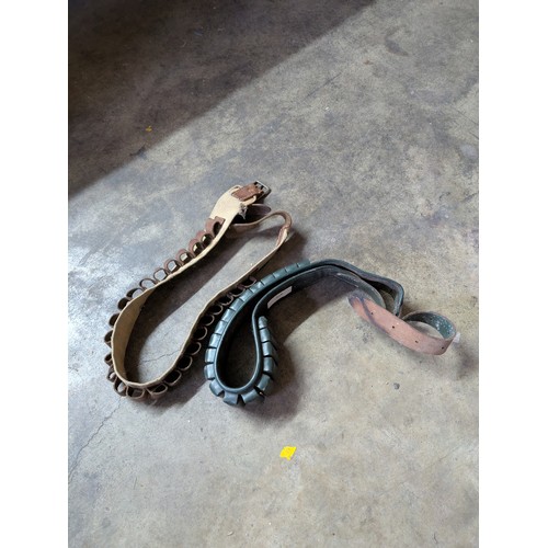 A pair of shotgun shell belts