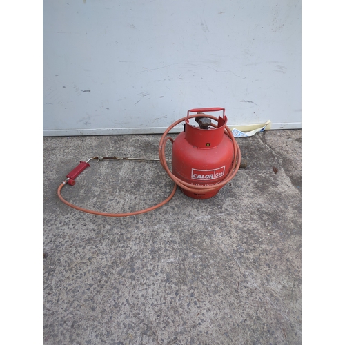 A part full 3.9kg calor gas bottle with torch