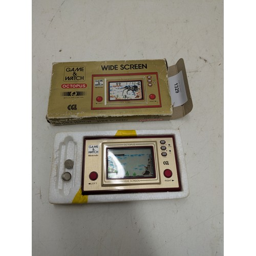 A 1981 Nintendo game and watch octopus game in original box