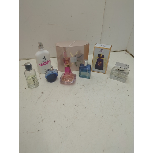 A quantity of various perfumes and scents
