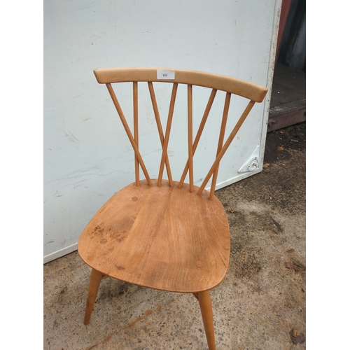 A pair of retro Ercol dining chairs