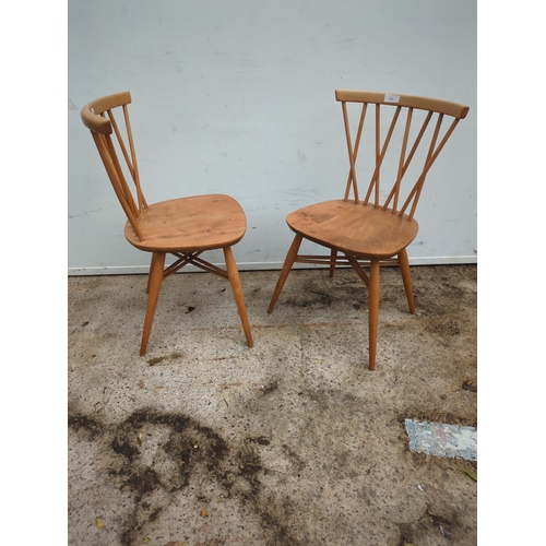 A pair of retro Ercol dining chairs