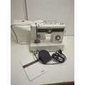 A Frister and Rossman Panda 5 sewing machine with pedal