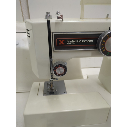 A Frister and Rossman Panda 5 sewing machine with pedal