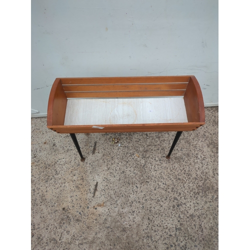A Retro plant stand trough