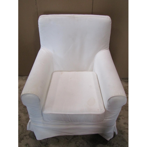 A contemporary but traditional style armchair simply upholstered in ...