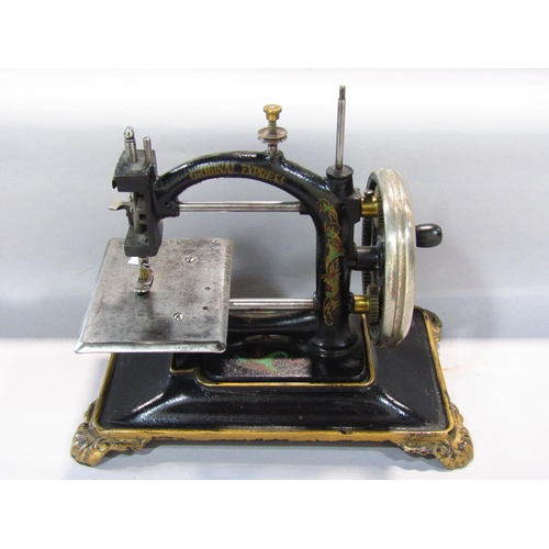 A small original Express Victorian chainstitch sewing machine