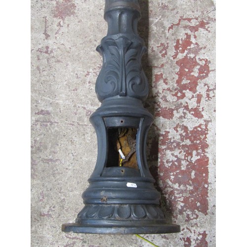 A pair of Victorian style cast iron street lamp posts (lacks hoods ...