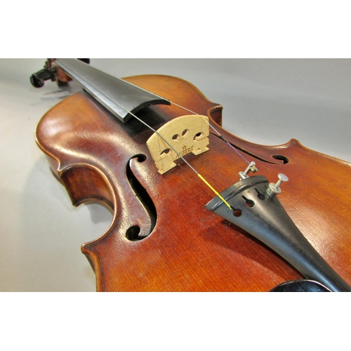 An old violin with a label to the interior Antonius Stradivarius ...